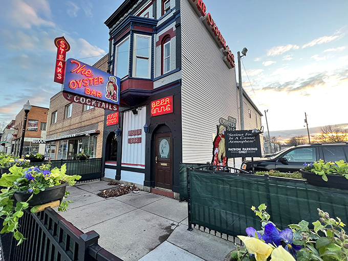 The Oyster Bar's vintage neon sign glows like a maritime lighthouse, guiding hungry Hoosiers to this Fort Wayne seafood sanctuary.