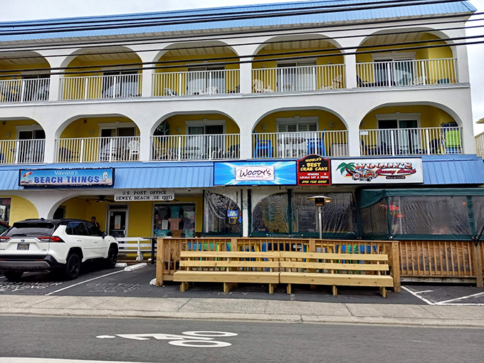 The unassuming blue awning of Woody's might not scream "food destination," but locals know this Dewey Beach treasure houses crab cake royalty.