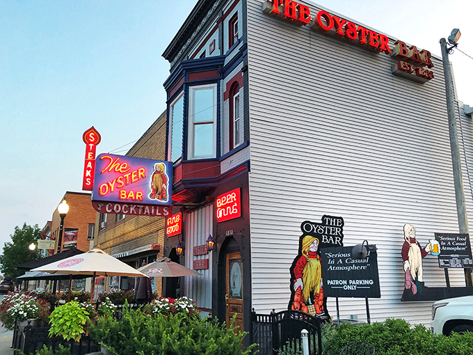 The Oyster Bar's vintage neon sign glows like a maritime lighthouse, guiding hungry Hoosiers to this Fort Wayne seafood sanctuary.