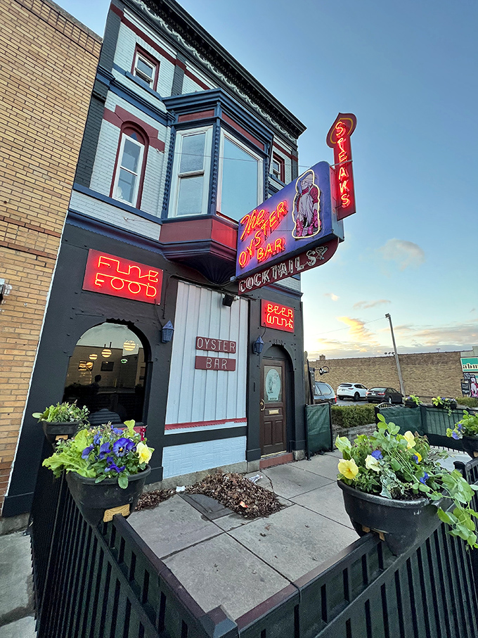 The Oyster Bar's vintage neon sign glows like a maritime lighthouse, guiding hungry Hoosiers to this Fort Wayne seafood sanctuary.