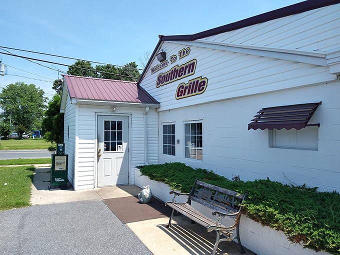 The unassuming white exterior of Southern Grille welcomes you like an old friend who doesn't need fancy clothes to prove their worth. 