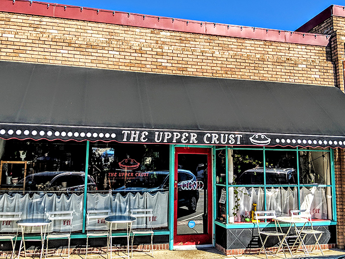 The unassuming storefront of The Upper Crust hides culinary treasures that would make any dessert detective's career. The black awning and brick fa&ccedil;ade promise old-school authenticity.  