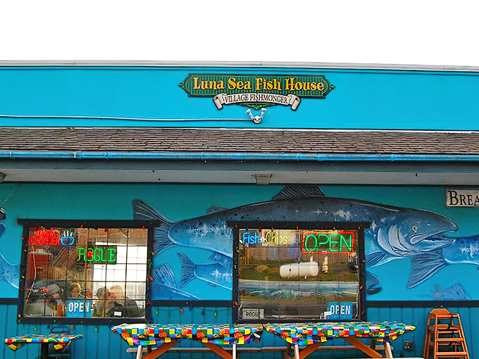 The turquoise beacon of Luna Sea Fish House stands out against Oregon's moody skies, promising seafood salvation to hungry coastal travelers.