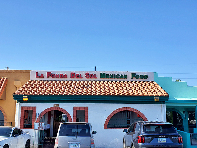 The unassuming entrance to flavor paradise. La Fonda Del Sol's charming exterior promises authentic Mexican cuisine behind those welcoming doors.