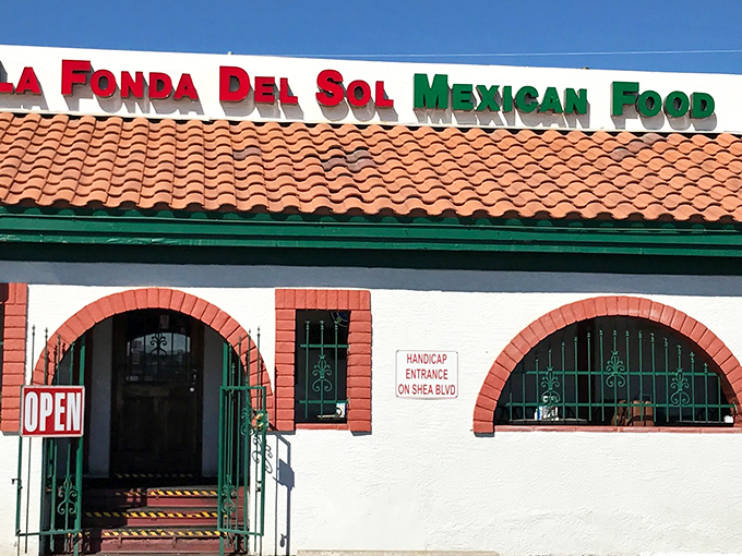 The unassuming entrance to flavor paradise. La Fonda Del Sol's charming exterior promises authentic Mexican cuisine behind those welcoming doors.