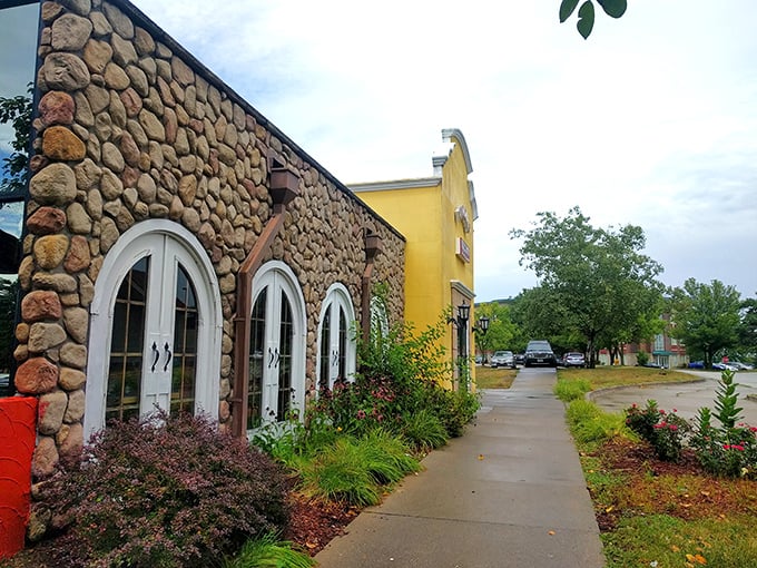 The sunshine-yellow exterior of Mi Mexico stands like a beacon of culinary promise in Clive, inviting hungry travelers to step inside and discover authentic flavors.