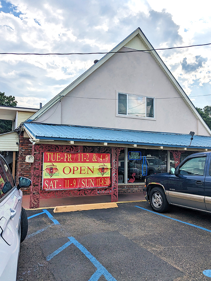 The unassuming A-frame exterior with its bright blue awning and red signage is like a secret handshake&mdash;those who know, know.
