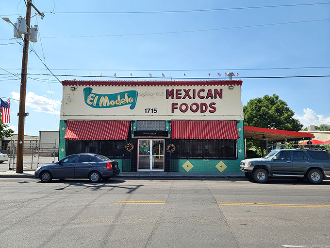 The turquoise and cream exterior of El Modelo stands like a beacon of culinary promise on Second Street, its vintage sign practically whispering "authentic Mexican food inside."