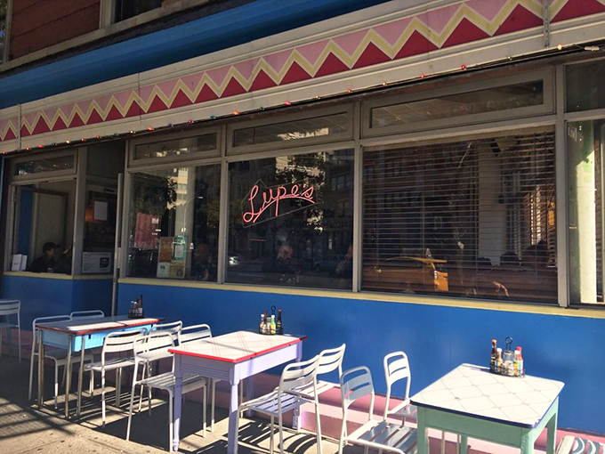 The blue storefront of Lupe's stands out on the corner like a colorful oasis in SoHo's urban landscape, beckoning hungry passersby with the promise of authentic Mexican flavors.