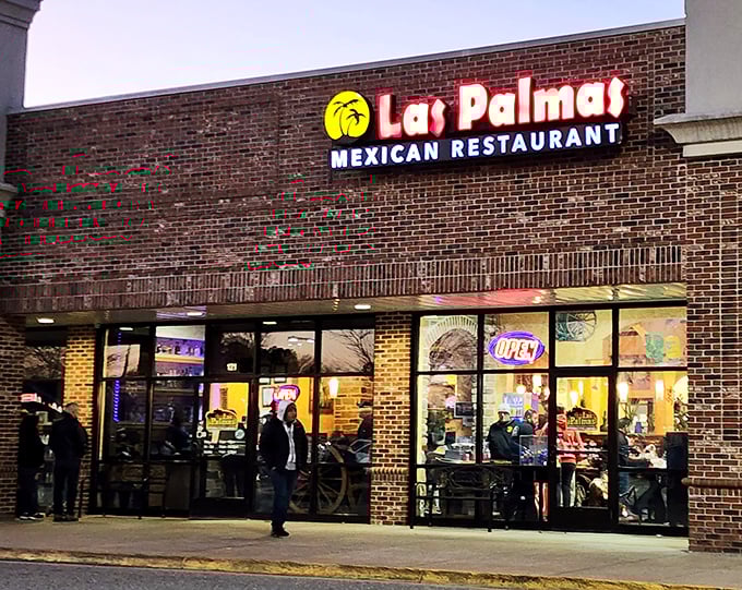The brick fa&ccedil;ade of Las Palmas welcomes hungry visitors with its cheerful palm tree logo and bold red lettering&mdash;a modest exterior hiding culinary treasures within.