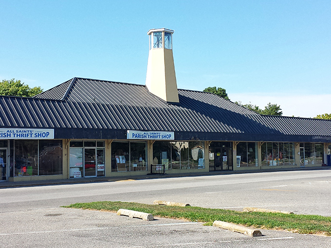 The iconic yellow bell tower of All Saints' Parish Thrift Shop stands like a lighthouse, guiding bargain hunters to this treasure-filled haven on Coastal Highway.