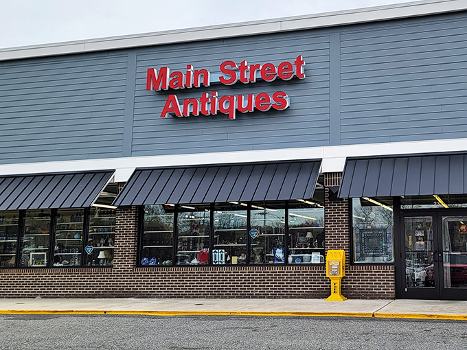 The unassuming storefront hides a universe of treasures within. Like finding a portal to the past behind that bold red signage.