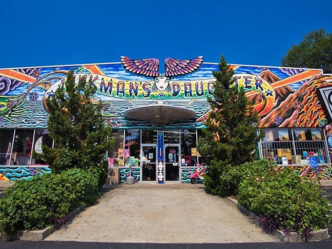 The psychedelic facade of Junkman's Daughter looks like what would happen if Salvador Dal&iacute; designed a retail store. Wings, hands, and cosmic imagery announce: normal stuff definitely not sold here.