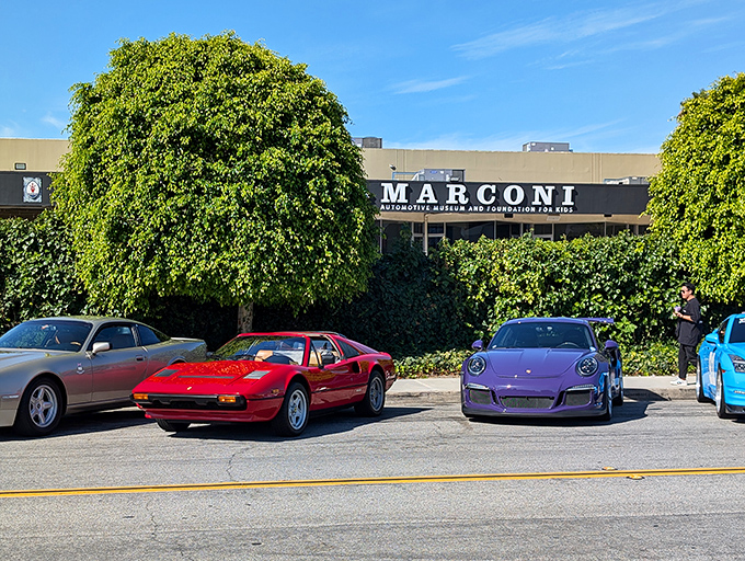 Even the parking lot is a car show at Marconi Automotive Museum, where Ferraris and Porsches casually hang out front like they're waiting for coffee.