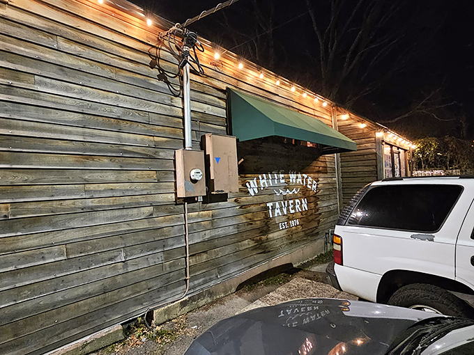 The unassuming wooden exterior of White Water Tavern stands as Little Rock's worst-kept secret, string lights promising adventures that Instagram filters can't capture.