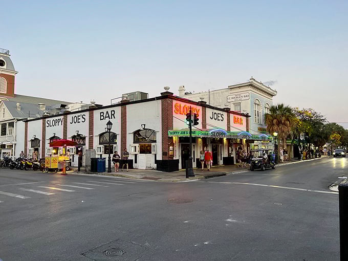 The iconic red and white fa&ccedil;ade of Sloppy Joe's stands proudly on Duval Street, beckoning visitors like a lighthouse for the thirsty sailor.