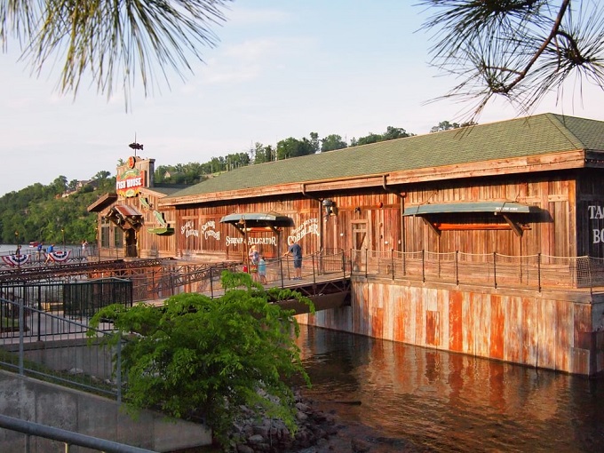 Rustic charm meets lakeside dining at White River Fish House, where weathered wood and water create the perfect Missouri mealtime marriage.