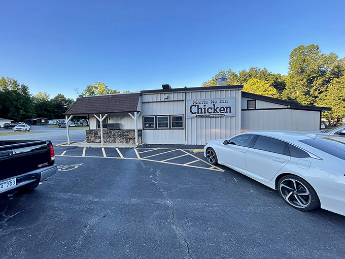 The stone facade and iconic chicken sign welcome hungry pilgrims to Monte Ne Inn, where poultry perfection has been the religion for over four decades.