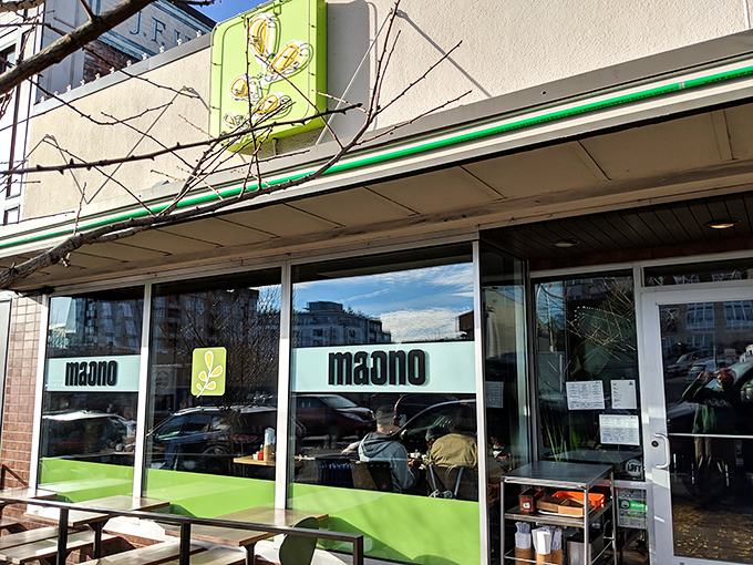 The unassuming exterior of Ma'ono hides culinary treasures within, like finding a rare vinyl record in a plain sleeve. That bright green chicken sign is your beacon to fried chicken nirvana.