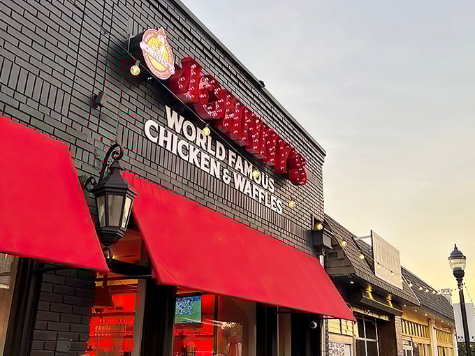 Johnny's bold red awnings and illuminated signage stand out like a beacon for hungry travelers. Southern hospitality begins at the curb.