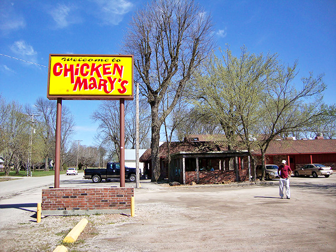The bright yellow sign beckons like a lighthouse for hungry travelers. Chicken Mary's unpretentious exterior promises what truly matters: legendary fried chicken worth the journey.