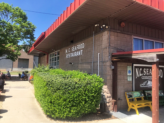 The unassuming exterior of N.C. Seafood Restaurant stands as a beacon for seafood lovers&mdash;architectural flair takes a backseat to what really matters: the food inside.