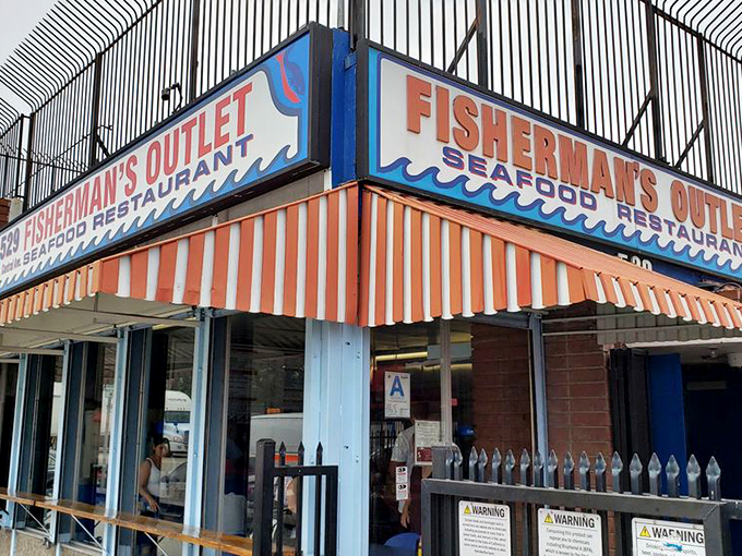 The red and white striped awning of Fisherman's Outlet stands like a beacon for seafood lovers in downtown LA's industrial district.