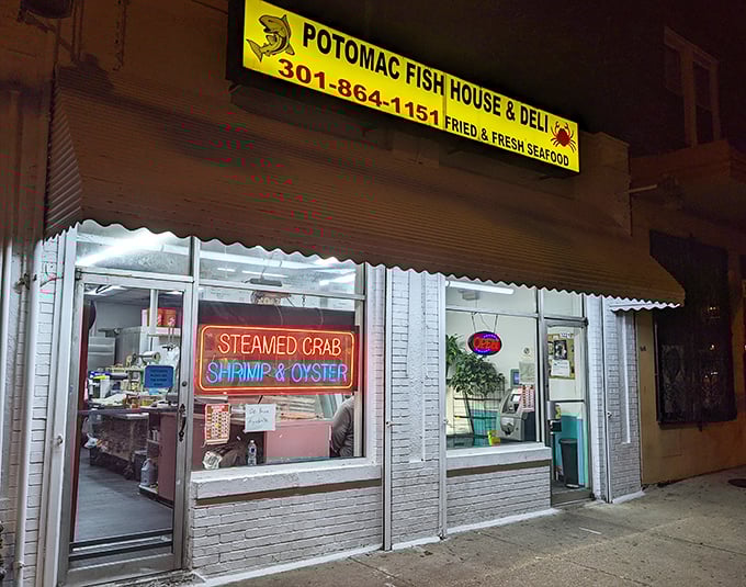 The bright yellow sign beckons seafood lovers like a lighthouse guiding hungry sailors to shore. No fancy frills, just the promise of fried perfection.