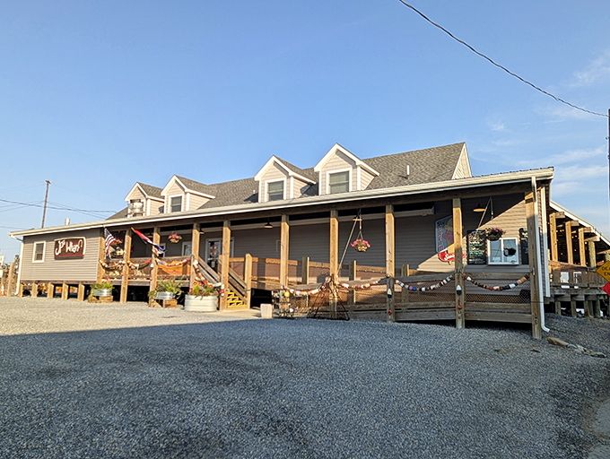 The quintessential coastal dining experience awaits on this weathered deck, where every table comes with a side of Delaware Bay breezes and waterfront tranquility.
