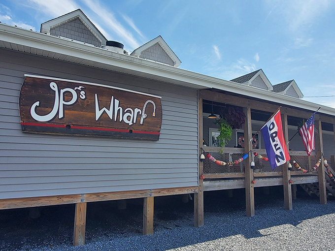 The quintessential coastal dining experience awaits on this weathered deck, where every table comes with a side of Delaware Bay breezes and waterfront tranquility.