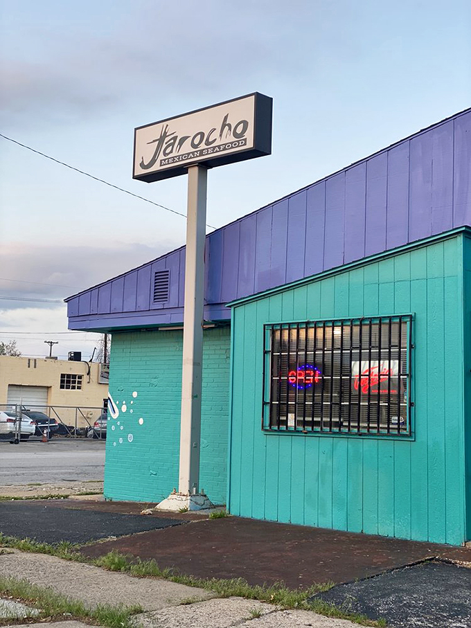 The turquoise building with its playful octopus mural stands like a colorful mirage in Kansas City, promising seafood treasures within.