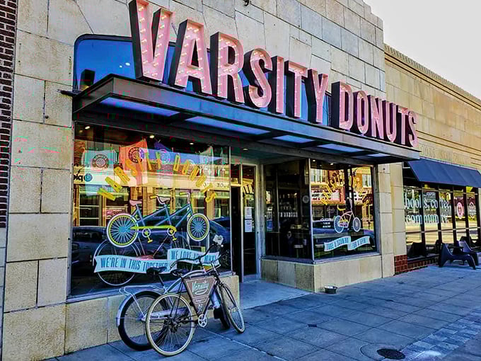 The marquee-style sign at Varsity Donuts lights up Aggieville like a Broadway show where the starring role goes to fried dough and happiness.