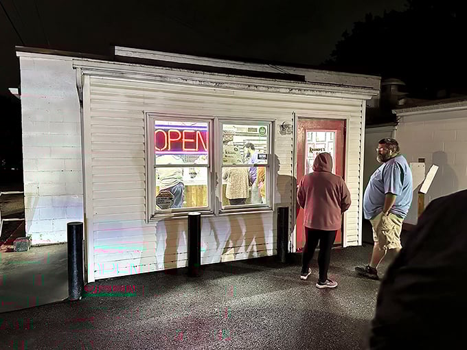 The humble white building with its glowing "OPEN" sign becomes a midnight beacon for donut pilgrims. Night owls know: this unassuming alley holds Hagerstown's sweetest treasures.