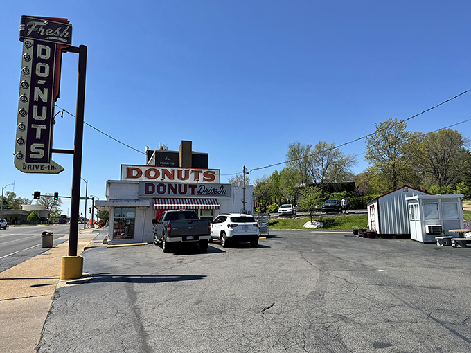 The iconic white building with its vintage red signage stands as a Route 66 landmark, beckoning sugar-seekers like a sweet mirage in the St. Louis cityscape. 