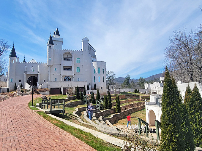 Uhuburg rises from the Georgia landscape like a fairytale illustration come to life, its white towers and terraced gardens creating an unexpected European mirage in Appalachia.