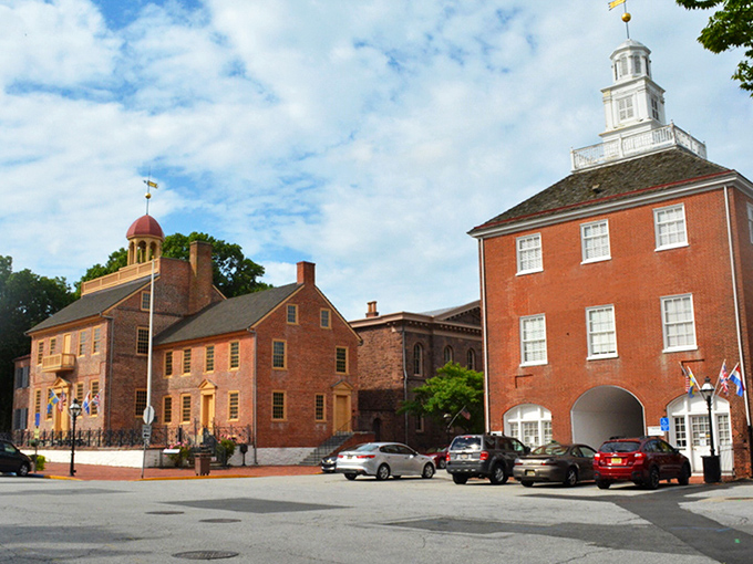 The historic district's red-brick buildings stand like a colonial time capsule, where America's founding story unfolds with every cobblestone step.