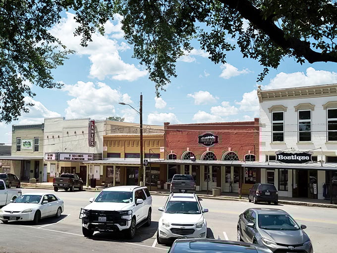 Downtown Llano stretches before you like a classic Texas postcard—historic storefronts, pickup trucks, and that big sky promising adventure around every corner.