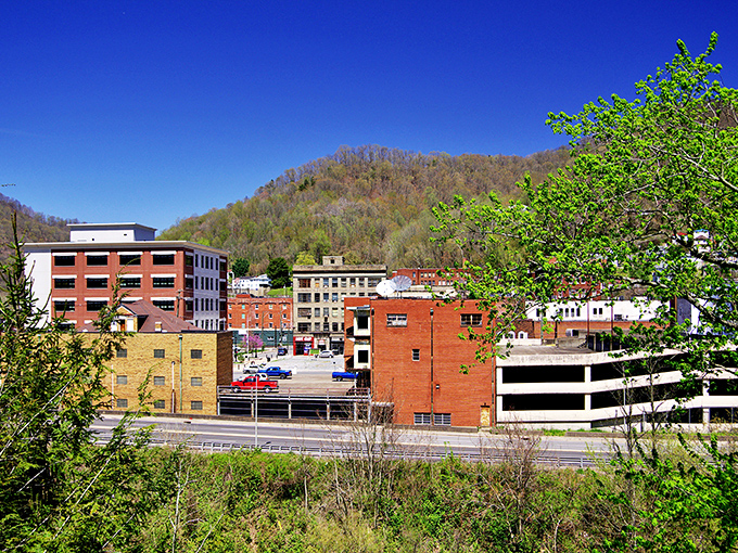 Logan's downtown nestles perfectly between verdant mountains, like a movie set where Appalachian charm meets real-world grit and unexpected beauty.