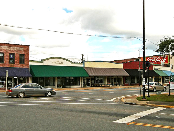 Downtown Marianna's historic buildings stand as colorful sentinels of small-town charm, where brick facades tell stories that parking meters can't charge for.