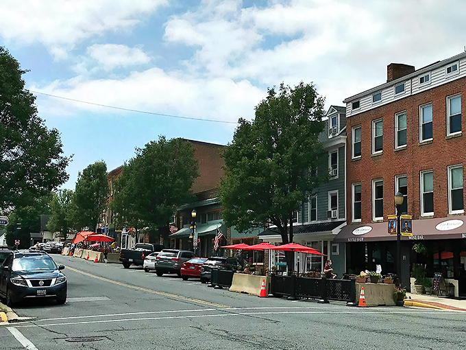 Washington Street welcomes visitors with its classic brick facades and outdoor dining spots. Small-town charm with big-city culinary aspirations.