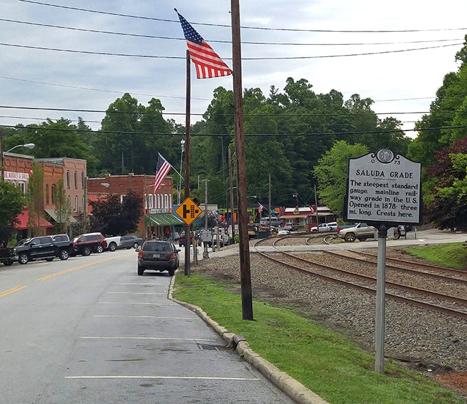 Main Street Saluda welcomes you with historic brick buildings, a vintage military cannon, and that small-town charm that makes you want to cancel your return flight.