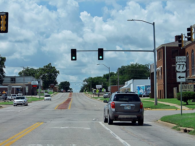 Highway 77 cuts through Perry like a ribbon unwrapping a gift, inviting travelers to slow down and discover what lies beyond the traffic light.