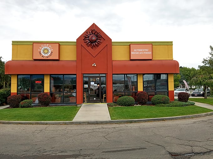 The sunshine-colored exterior isn't just eye-catching&mdash;it's a beacon of culinary promise that stands out like a delicious mirage in Garden City's landscape.