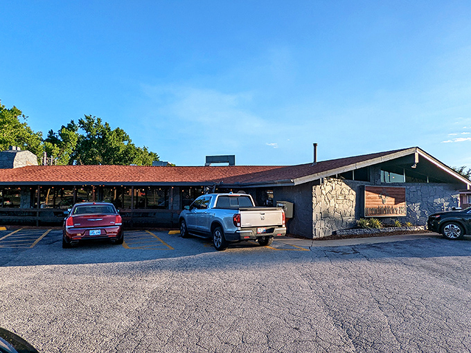 The sun-bleached Route 66 sign against stone and wood tells you everything &ndash; authentic southwestern flavors await behind these doors. 