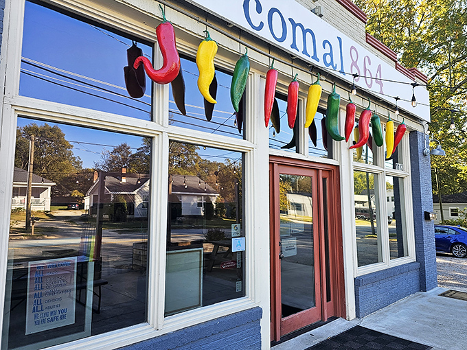 The colorful chili pepper garland hanging above Comal 864's entrance isn't just decoration&mdash;it's a preview of the flavor fiesta waiting inside.