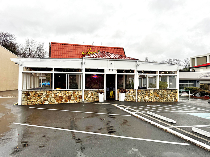 The distinctive terracotta roof and stone facade of Anita's stands like a Southwestern mirage in suburban Fairfax, beckoning hungry travelers with promises of New Mexican delights.