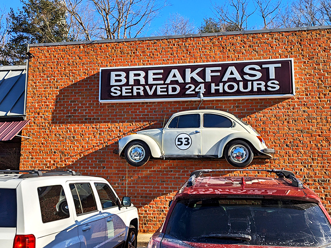 The iconic white Beetle #53 mounted on Herbie's brick exterior isn't just decoration&mdash;it's a beacon calling hungry travelers home to breakfast, served 24/7. 
