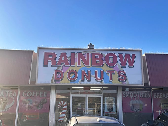 The pink-roofed sanctuary of sweetness beckons from McDowell Road, promising sugary salvation to early risers and donut devotees alike.