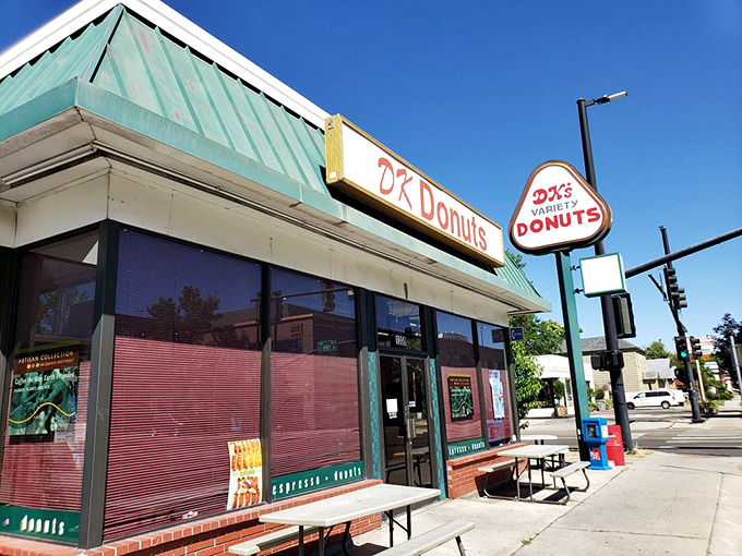 The green-roofed temple of fried dough stands like a beacon on State Street, promising sweet salvation to all who enter.