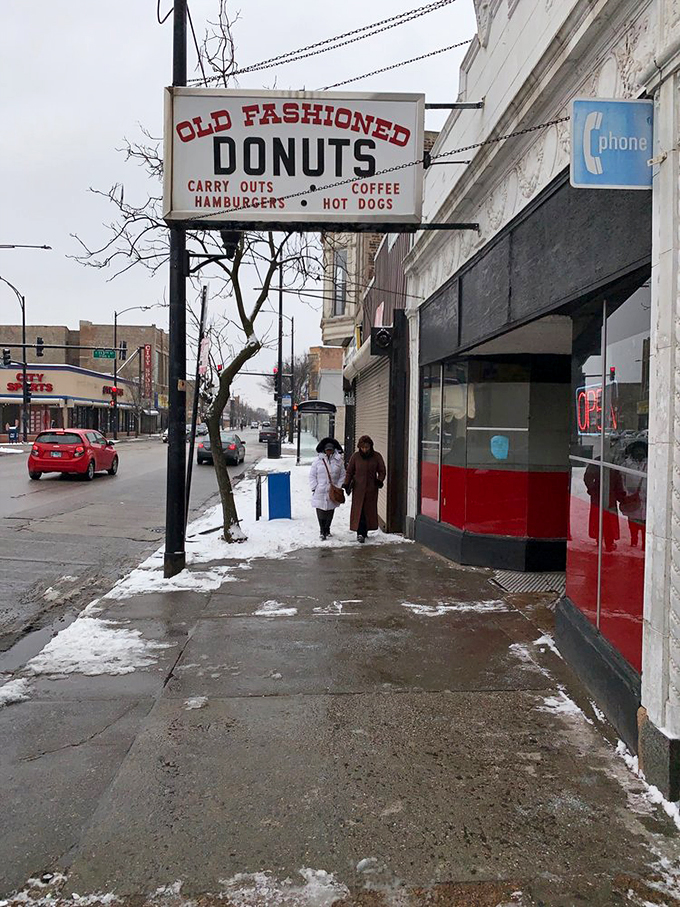 The unassuming white storefront with its vintage sign promises simple pleasures that fancy downtown bakeries can only dream of replicating.
